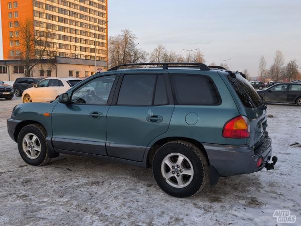 Hyundai Santa Fe 2003 in Vilnius, with an engine capacity of 2.40 L and mileage of 171 thousand km for 1390 €, photo 1 on AUTOMOTO.COM.LV