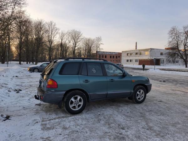 Hyundai Santa Fe 2003 in Vilnius, with an engine capacity of 2.40 L and mileage of 171 thousand km for 1390 €, photo 4 on AUTOMOTO.COM.LV