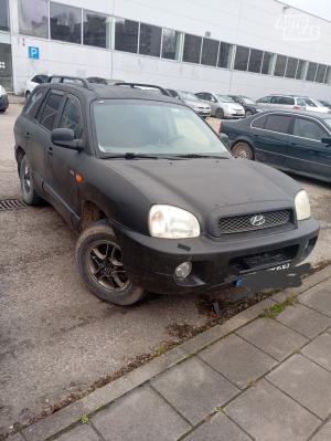 Hyundai Santa Fe 2003 in Kaunas, with an engine capacity of 2.00 L and mileage of 300 thousand km for 500 €, photo  on AUTOMOTO.COM.LV