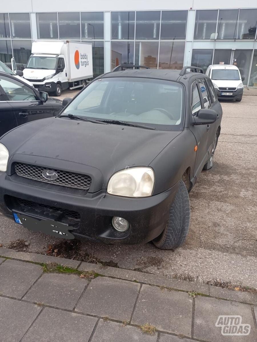 Hyundai Santa Fe 2003 in Kaunas, with an engine capacity of 2.00 L and mileage of 300 thousand km for 500 €, photo 3 on AUTOMOTO.COM.LV