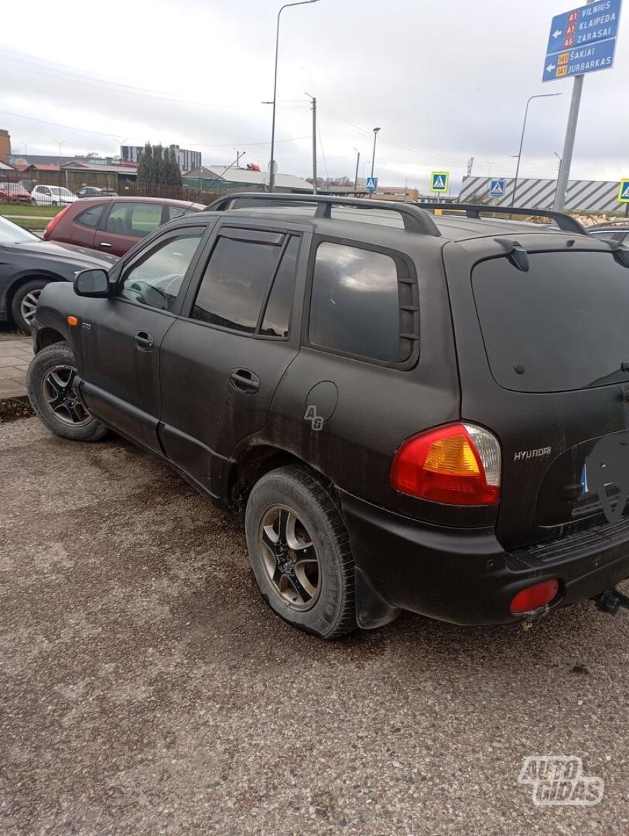 Hyundai Santa Fe 2003 in Kaunas, with an engine capacity of 2.00 L and mileage of 300 thousand km for 500 €, photo 5 on AUTOMOTO.COM.LV