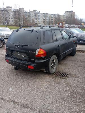 Hyundai Santa Fe 2004 in Kaunas, with an engine capacity of 2.00 L and mileage of 302 thousand km for 700 €, photo  on AUTOMOTO.COM.LV