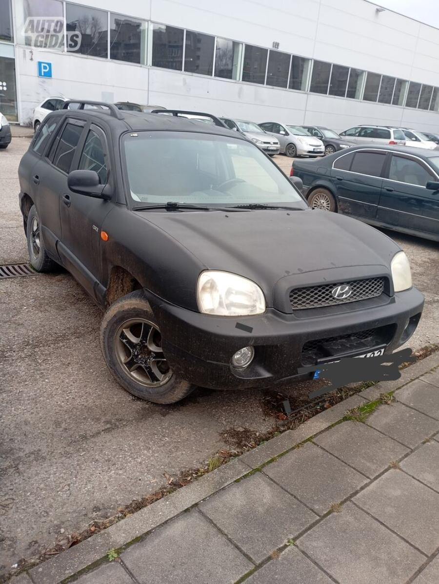 Hyundai Santa Fe 2004 in Kaunas, with an engine capacity of 2.00 L and mileage of 302 thousand km for 700 €, photo 5 on AUTOMOTO.COM.LV