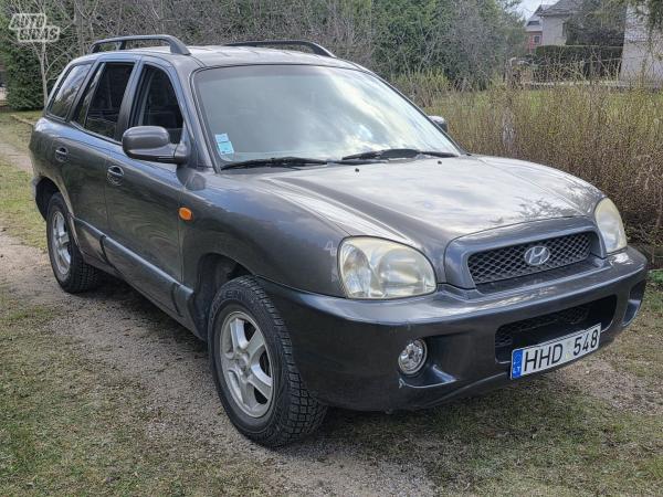 Hyundai Santa Fe 2004 in Taurage, with an engine capacity of 2.00 L and mileage of 218 thousand km for 1200 €, photo 4 on AUTOMOTO.COM.LV