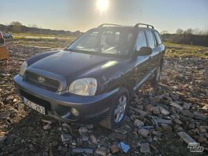 Hyundai Santa Fe 2004 in Kaunas, with an engine capacity of 2.00 L and mileage of 240 thousand km for 1000 €, photo  on AUTOMOTO.COM.LV