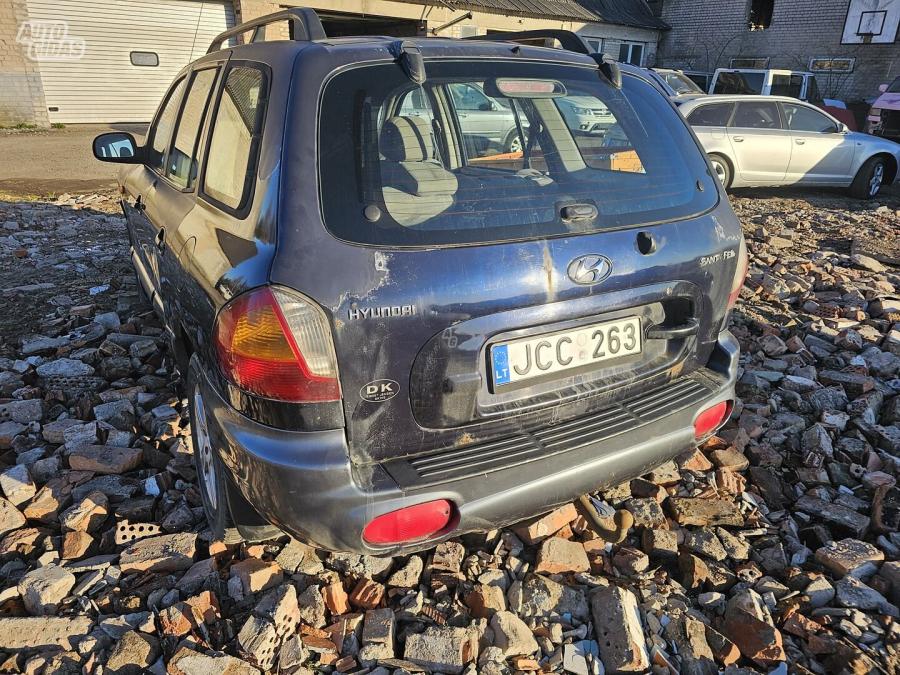 Hyundai Santa Fe 2004 in Kaunas, with an engine capacity of 2.00 L and mileage of 240 thousand km for 1000 €, photo 4 on AUTOMOTO.COM.LV