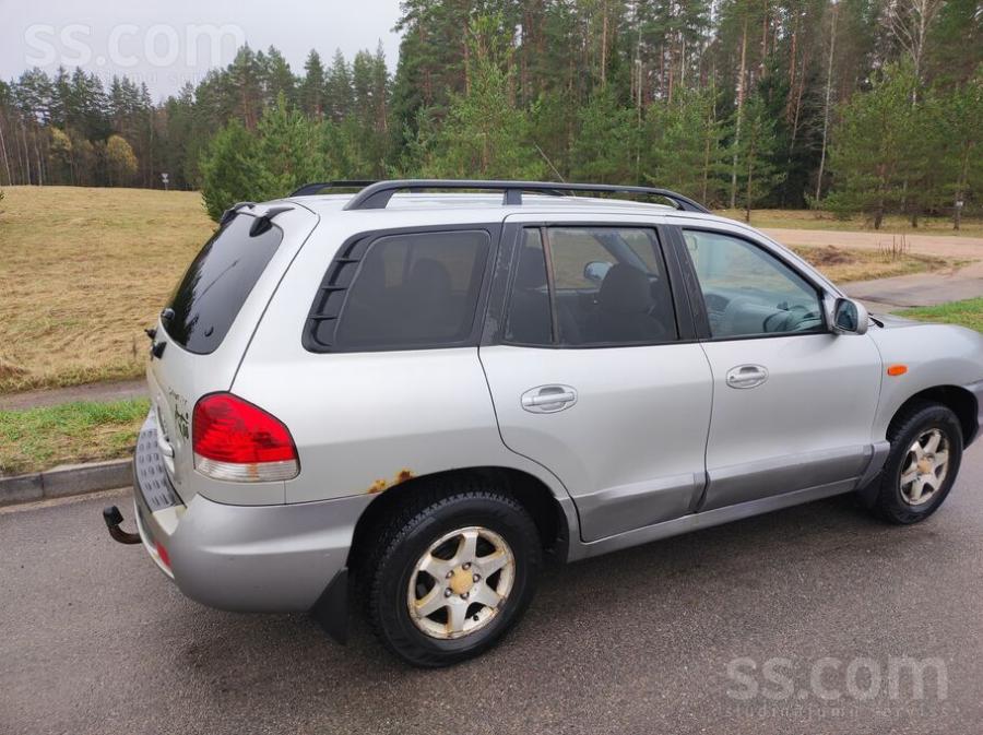 Hyundai Santa Fe 2005 in Riga, with an engine capacity of 2.40 L and mileage of 302 thousand km for 1800 €, photo 4 on AUTOMOTO.COM.LV