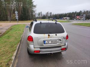 Hyundai Santa Fe 2005 in Riga, with an engine capacity of 2.40 L and mileage of 302 thousand km for 1800 €, photo 5 on AUTOMOTO.COM.LV