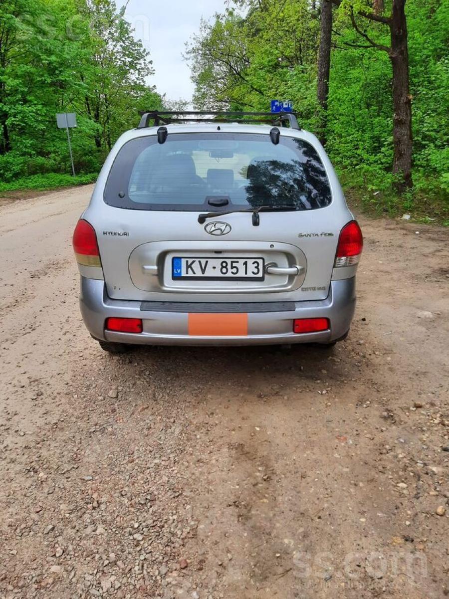 Hyundai Santa Fe 2005 Rīga, ar dzinēja tilpumu 2.40 L un nobraukumu 425 tūkst. km par 1500 €, foto 5 vietnē AUTOMOTO.COM.LV