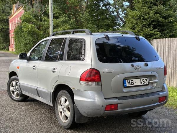 Hyundai Santa Fe 2005 in Riga, with an engine capacity of 2.70 L and mileage of 209 thousand km for 1550 €, photo 4 on AUTOMOTO.COM.LV