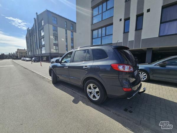 Hyundai Santa Fe 2012 in Kaunas, with an engine capacity of 2.00 L and mileage of 302 thousand km for 7499 €, photo 8 on AUTOMOTO.COM.LV