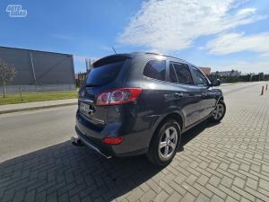 Hyundai Santa Fe 2012 in Kaunas, with an engine capacity of 2.00 L and mileage of 302 thousand km for 7499 €, photo 16 on AUTOMOTO.COM.LV