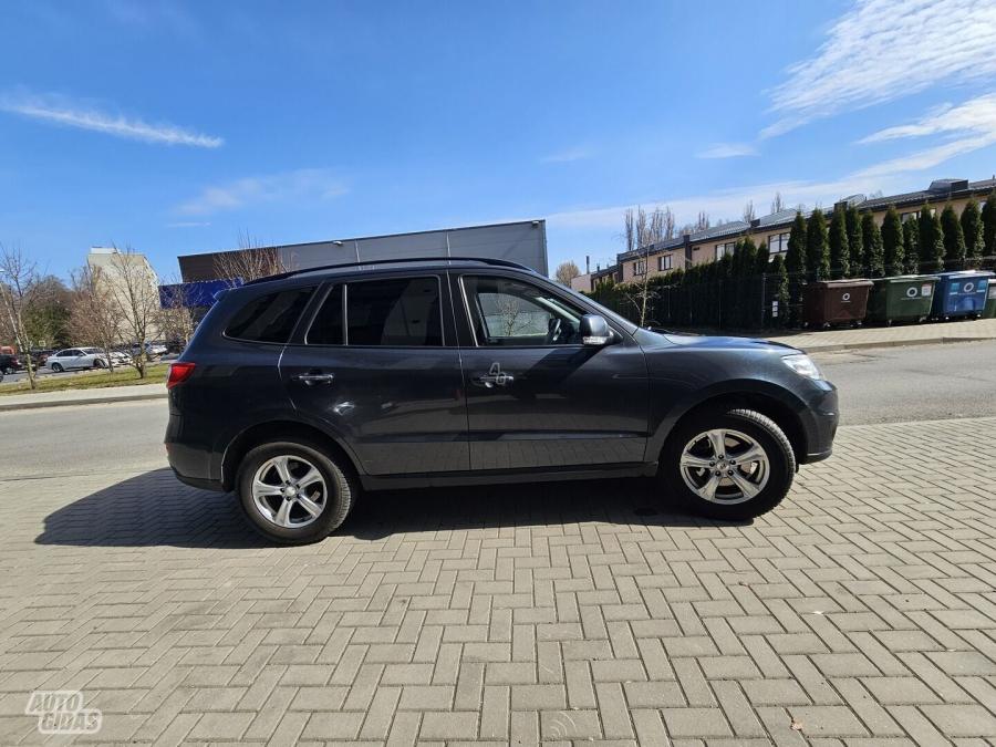 Hyundai Santa Fe 2012 in Kaunas, with an engine capacity of 2.00 L and mileage of 302 thousand km for 7499 €, photo 18 on AUTOMOTO.COM.LV