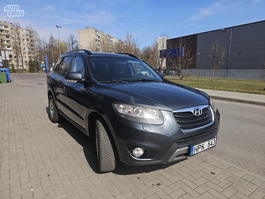 Hyundai Santa Fe 2012 in Kaunas, with an engine capacity of 2.00 L and mileage of 302 thousand km for 7499 €, photo 21 on AUTOMOTO.COM.LV