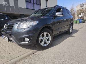 Hyundai Santa Fe 2012 in Kaunas, with an engine capacity of 2.00 L and mileage of 302 thousand km for 7499 €, photo 23 on AUTOMOTO.COM.LV