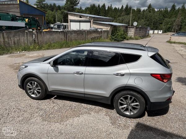 Hyundai Santa Fe 2013 in Utena, with an engine capacity of 2.20 L and mileage of 196 thousand km for 7850 €, photo 8 on AUTOMOTO.COM.LV