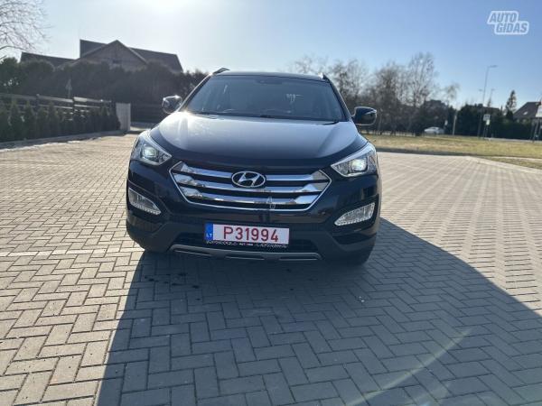 Hyundai Santa Fe 2014 in Kaunas, with an engine capacity of 2.00 L and mileage of 125 thousand km for 9393 €, photo 3 on AUTOMOTO.COM.LV