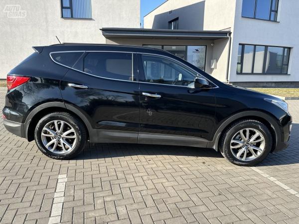 Hyundai Santa Fe 2014 in Kaunas, with an engine capacity of 2.00 L and mileage of 125 thousand km for 9393 €, photo 5 on AUTOMOTO.COM.LV
