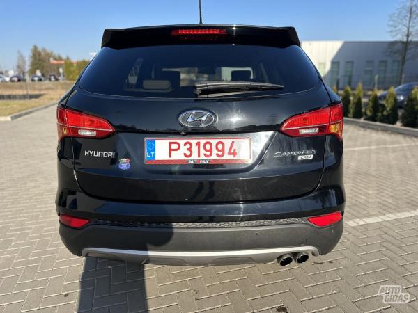 Hyundai Santa Fe 2014 in Kaunas, with an engine capacity of 2.00 L and mileage of 125 thousand km for 9393 €, photo 7 on AUTOMOTO.COM.LV