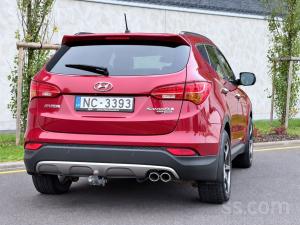 Hyundai Santa Fe 2014 in Riga, with an engine capacity of 2.20 L and mileage of 219 thousand km for 8450 €, photo 8 on AUTOMOTO.COM.LV
