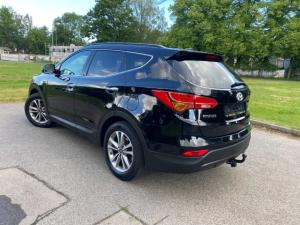 Hyundai Santa Fe 2015 Rīga, ar dzinēja tilpumu 2.20 L un nobraukumu 133 tūkst. km par 15950 €, foto 5 vietnē AUTOMOTO.COM.LV