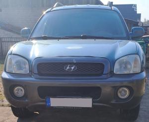 Zaļš Hyundai Santa Fe 2001 Viļņa, ar dzinēja tilpumu 2.40 L un nobraukumu 266 tūkst. km par 1800 €, foto 5 vietnē AUTOMOTO.COM.LV