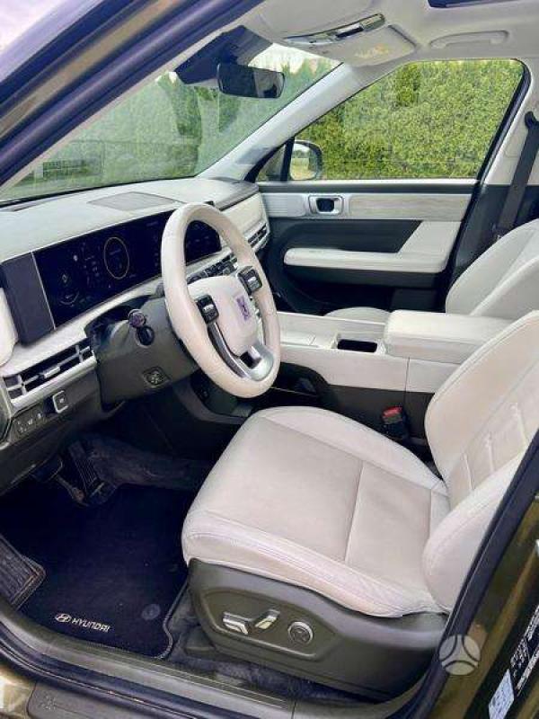 Green Hyundai Santa Fe 2024 in Vilnius, with an engine capacity of 1.60 L and mileage of 46 thousand km for 49900 €, photo 5 on AUTOMOTO.COM.LV