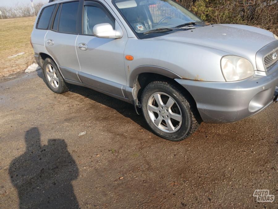 Pelēks Hyundai Santa Fe 2001 Panevēža, ar dzinēja tilpumu 2.70 L un nobraukumu 225 tūkst. km par 1050 €, foto 1 vietnē AUTOMOTO.COM.LV