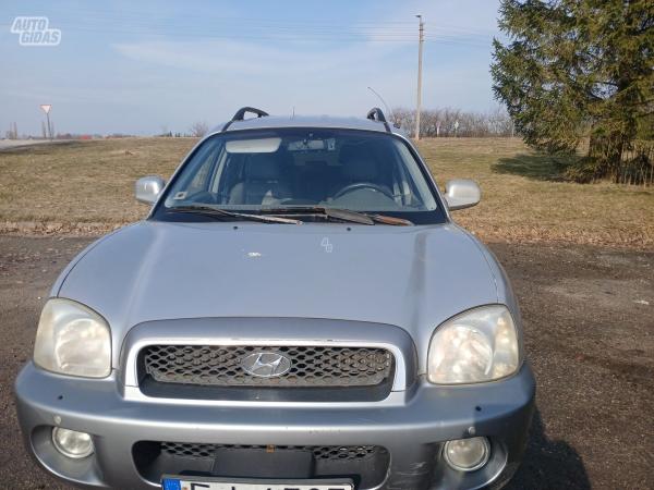 Pelēks Hyundai Santa Fe 2001 Panevēža, ar dzinēja tilpumu 2.70 L un nobraukumu 225 tūkst. km par 1050 €, foto 2 vietnē AUTOMOTO.COM.LV