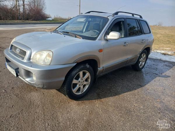 Pelēks Hyundai Santa Fe 2001 Panevēža, ar dzinēja tilpumu 2.70 L un nobraukumu 225 tūkst. km par 1050 €, foto 3 vietnē AUTOMOTO.COM.LV