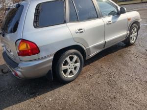 Pelēks Hyundai Santa Fe 2001 Panevēža, ar dzinēja tilpumu 2.70 L un nobraukumu 225 tūkst. km par 1050 €, foto 5 vietnē AUTOMOTO.COM.LV