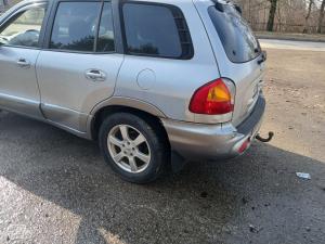 Pelēks Hyundai Santa Fe 2001 Panevēža, ar dzinēja tilpumu 2.70 L un nobraukumu 225 tūkst. km par 1050 €, foto 6 vietnē AUTOMOTO.COM.LV