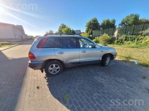 Pelēks Hyundai Santa Fe 2002 Rīga, ar dzinēja tilpumu 2.00 L un nobraukumu 314 tūkst. km par 700 €, foto 4 vietnē AUTOMOTO.COM.LV
