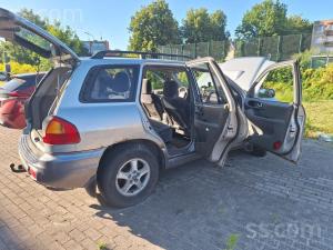 Pelēks Hyundai Santa Fe 2002 Rīga, ar dzinēja tilpumu 2.00 L un nobraukumu 314 tūkst. km par 700 €, foto 8 vietnē AUTOMOTO.COM.LV