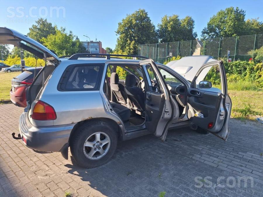 Pelēks Hyundai Santa Fe 2002 Rīga, ar dzinēja tilpumu 2.00 L un nobraukumu 314 tūkst. km par 700 €, foto 10 vietnē AUTOMOTO.COM.LV