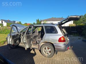 Pelēks Hyundai Santa Fe 2002 Rīga, ar dzinēja tilpumu 2.00 L un nobraukumu 314 tūkst. km par 700 €, foto 12 vietnē AUTOMOTO.COM.LV