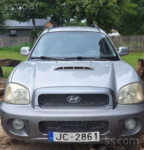 Pelēks Hyundai Santa Fe 2002 Ogre, ar dzinēja tilpumu 2.00 L un nobraukumu 300 tūkst. km par 850 €, foto 1 vietnē AUTOMOTO.COM.LV