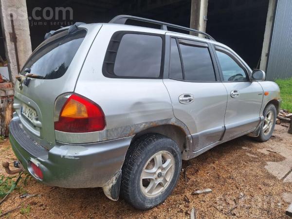 Pelēks Hyundai Santa Fe 2002 Ogre, ar dzinēja tilpumu 2.00 L un nobraukumu 300 tūkst. km par 850 €, foto 7 vietnē AUTOMOTO.COM.LV