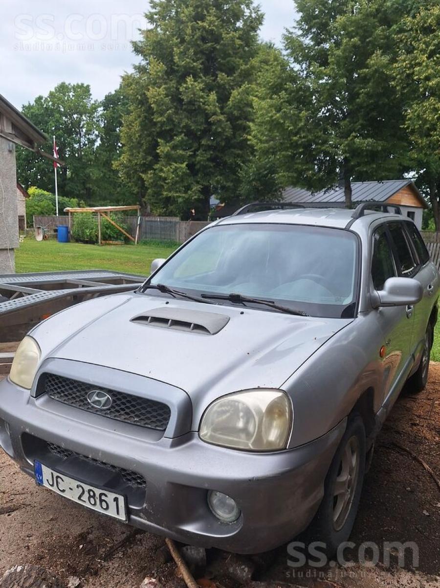 Pelēks Hyundai Santa Fe 2002 Ogre, ar dzinēja tilpumu 2.00 L un nobraukumu 300 tūkst. km par 850 €, foto 10 vietnē AUTOMOTO.COM.LV