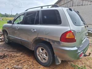 Pelēks Hyundai Santa Fe 2002 Ogre, ar dzinēja tilpumu 2.00 L un nobraukumu 300 tūkst. km par 850 €, foto 11 vietnē AUTOMOTO.COM.LV