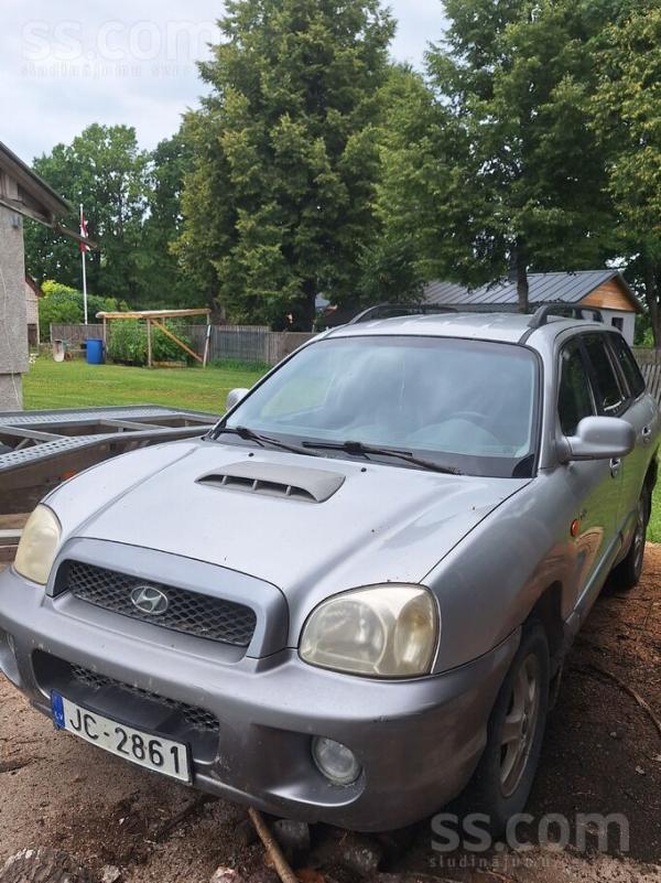 Pelēks Hyundai Santa Fe 2002 Ogre, ar dzinēja tilpumu 2.00 L un nobraukumu 300 tūkst. km par 850 €, foto 10 vietnē AUTOMOTO.COM.LV