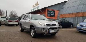 Pelēks Hyundai Santa Fe 2003 Valmiera, ar dzinēja tilpumu 2.40 L un nobraukumu 224 tūkst. km par 2400 €, foto  vietnē AUTOMOTO.COM.LV
