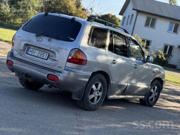 Hyundai Santa Fe 2003 Jūrmala vietnē Pelēks Hyundai Santa Fe 2003 Jūrmala, ar dzinēja tilpumu 2.00 L un nobraukumu 0 tūkst. km par 690 €, foto 4 vietnē AUTOMOTO.COM.LV