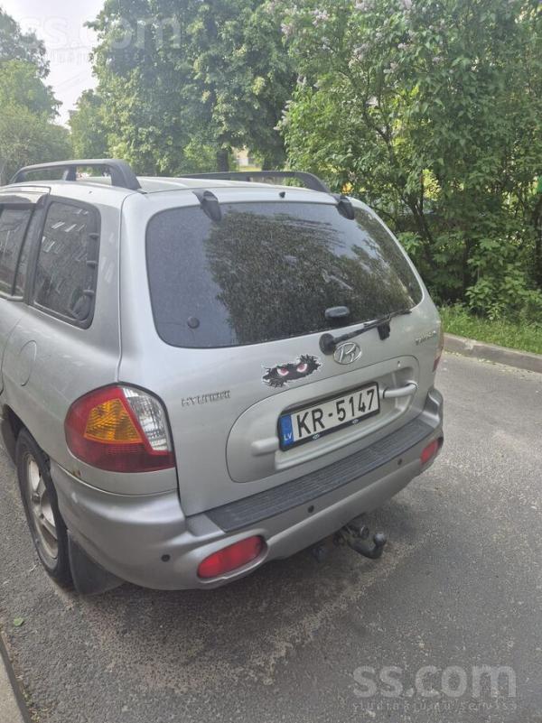 Pelēks Hyundai Santa Fe 2004 Rīga, ar dzinēja tilpumu 2.00 L un nobraukumu 0 tūkst. km par 1350 €, foto 3 vietnē AUTOMOTO.COM.LV
