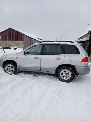 Grey Hyundai Santa Fe 2004 in Gargzdai, with an engine capacity of 1.99 L and mileage of 250 thousand km for 1100 €, photo  on AUTOMOTO.COM.LV