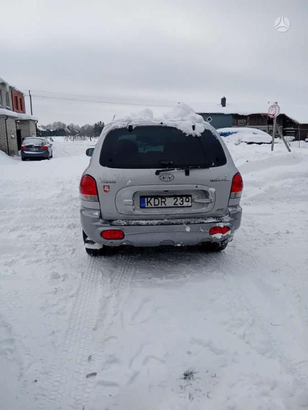 Grey Hyundai Santa Fe 2004 in Gargzdai, with an engine capacity of 1.99 L and mileage of 250 thousand km for 1100 €, photo 4 on AUTOMOTO.COM.LV