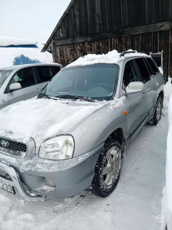 Grey Hyundai Santa Fe 2004 in Gargzdai, with an engine capacity of 1.99 L and mileage of 250 thousand km for 1100 €, photo 5 on AUTOMOTO.COM.LV