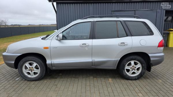 Grey Hyundai Santa Fe 2004 in Kretinga, with an engine capacity of 2.00 L and mileage of 226 thousand km for 1500 €, photo 3 on AUTOMOTO.COM.LV