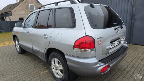 Grey Hyundai Santa Fe 2004 in Kretinga, with an engine capacity of 2.00 L and mileage of 226 thousand km for 1500 €, photo 4 on AUTOMOTO.COM.LV