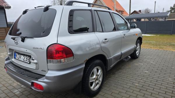 Grey Hyundai Santa Fe 2004 in Kretinga, with an engine capacity of 2.00 L and mileage of 226 thousand km for 1500 €, photo 6 on AUTOMOTO.COM.LV